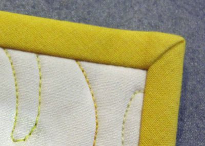 Quilting Basics: How to Fold a Mitered Corner - WeAllSew