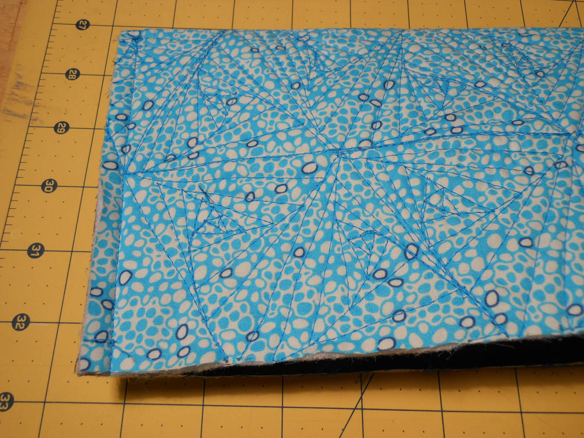 Pyramid Zipper Pouch from Free Motion Quilting Practice Squares - WeAllSew