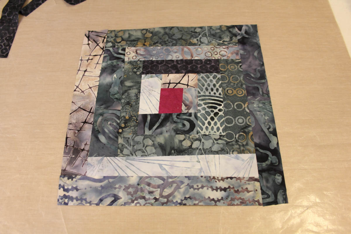 Fused log cabin table runner - WeAllSew