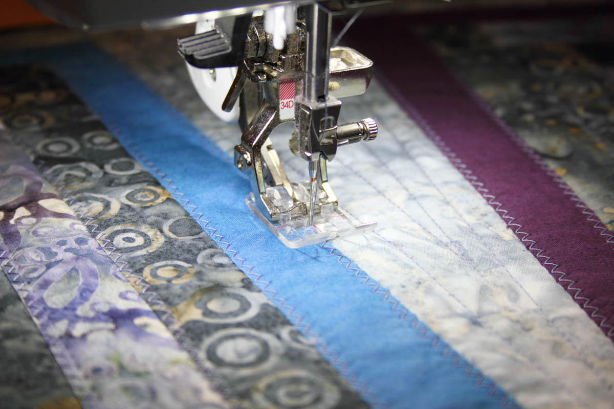 Fused log cabin table runner - WeAllSew