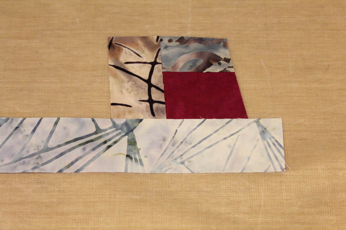 Fused log cabin table runner - WeAllSew