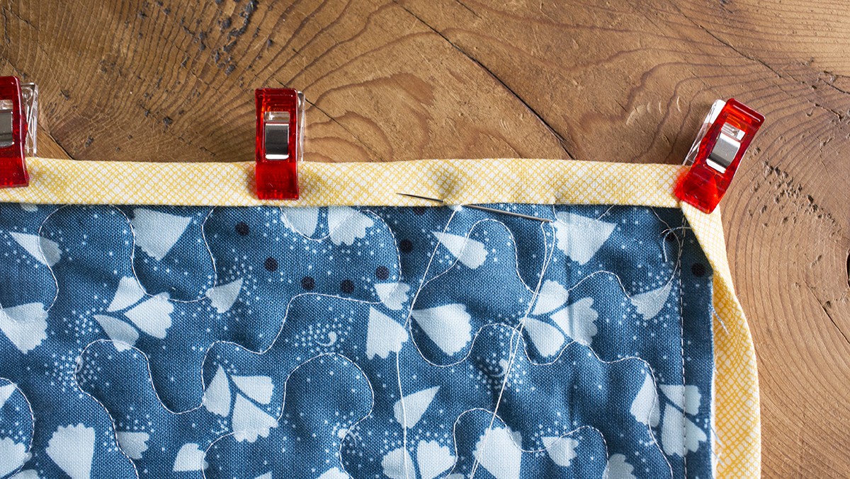 How to Bind a Quilt using Double Fold Binding - WeAllSew