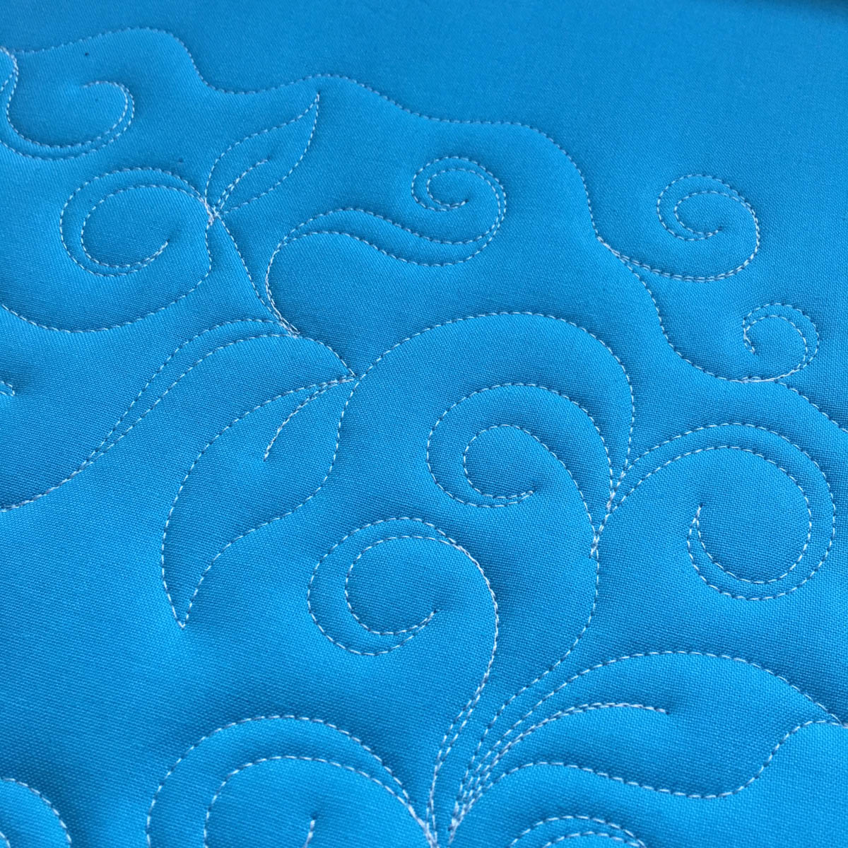 How to Free-Motion Quilt Swirl Designs - WeAllSew