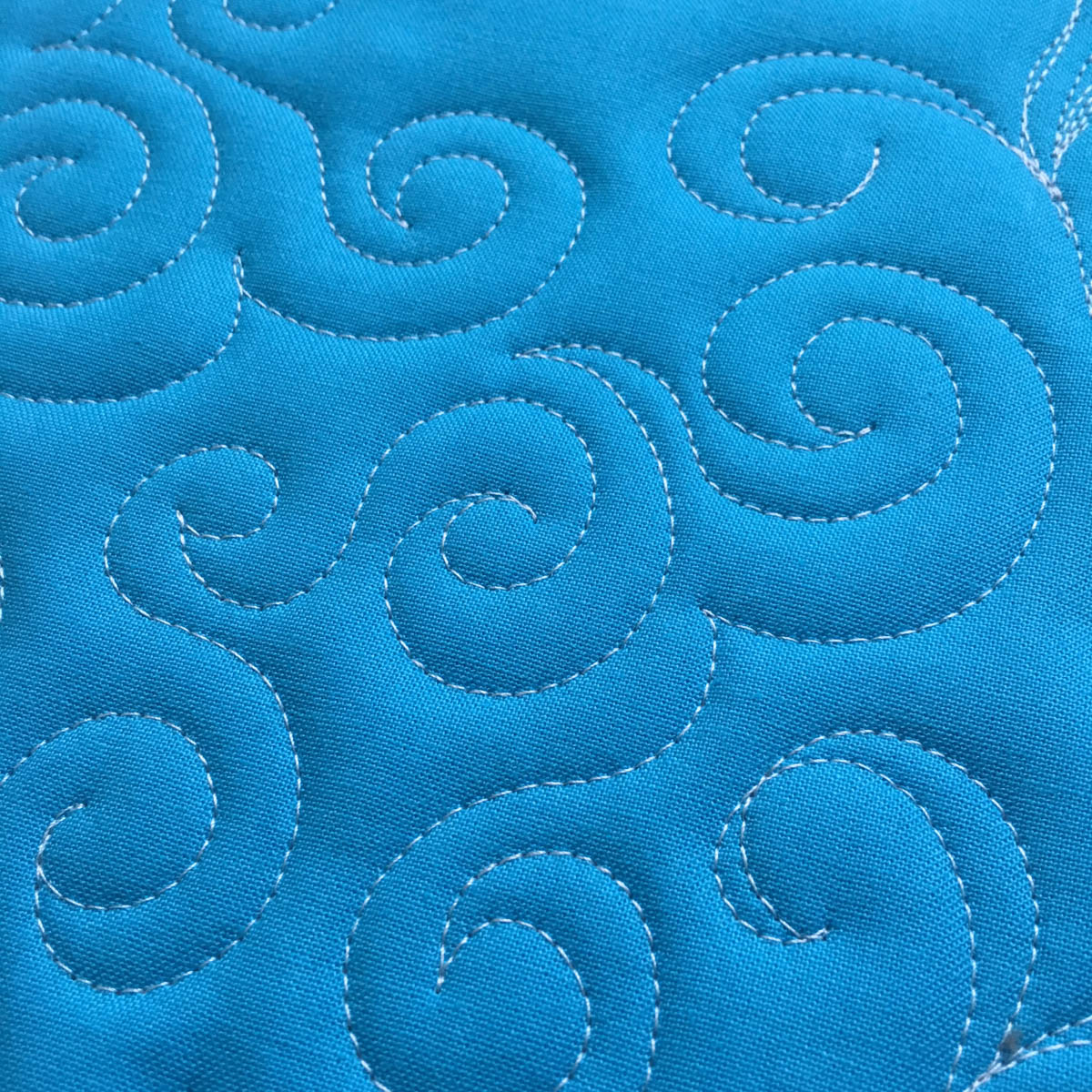 How to Free-Motion Quilt Swirl Designs - WeAllSew