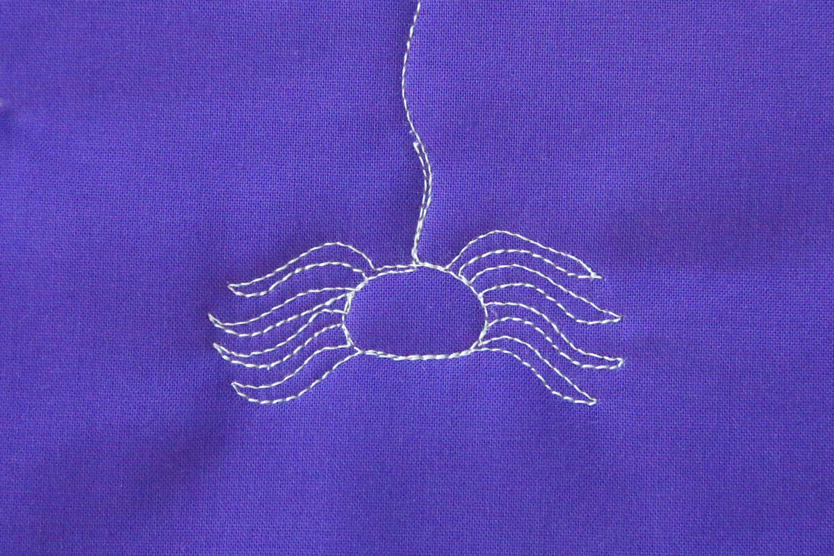 How to Free-motion Quilt a Spider Web - WeAllSew