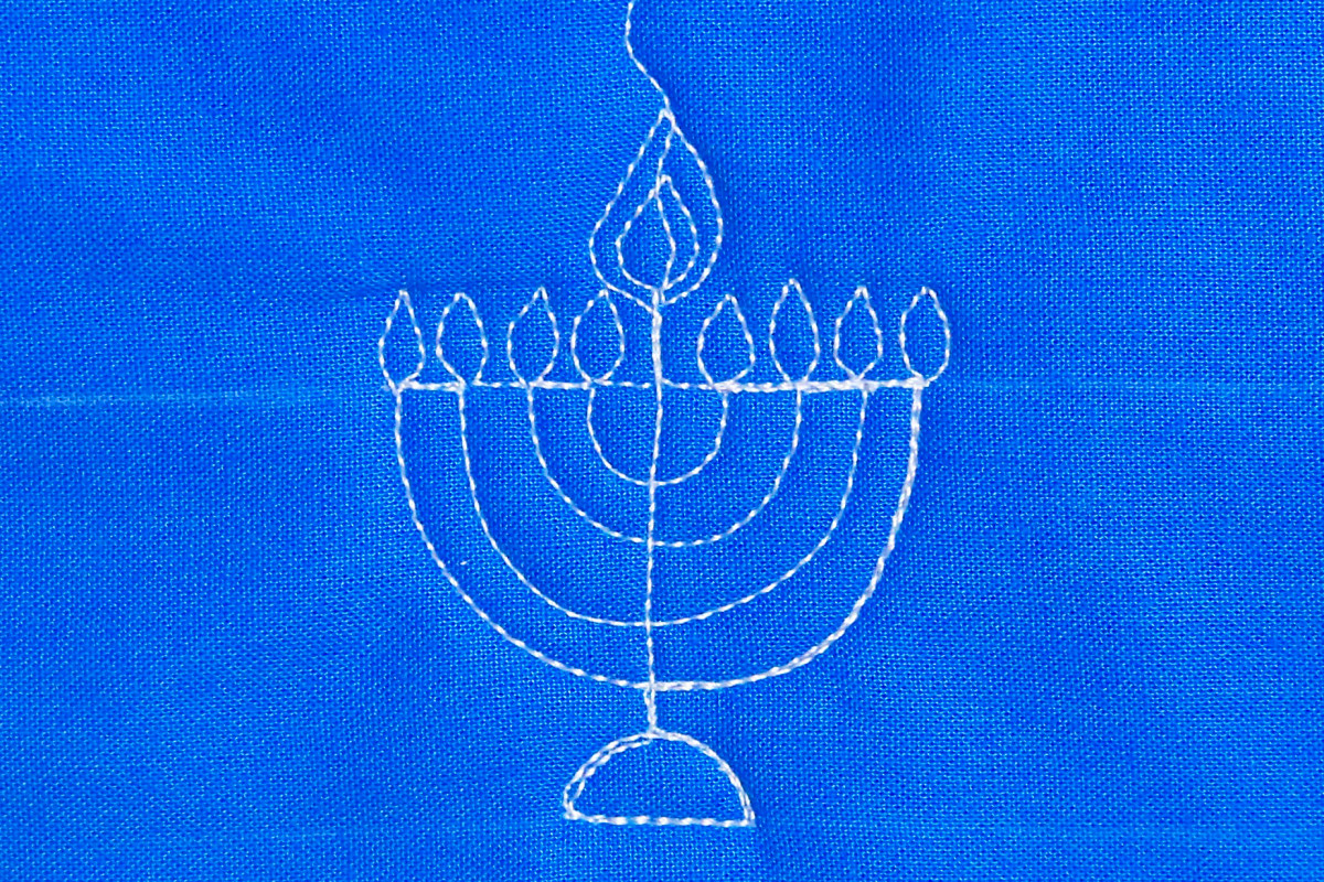 How To Free-Motion Quilt a Menorah - WeAllSew