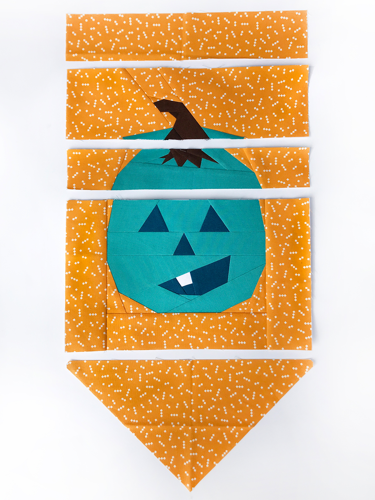 Sew a Paper Pieced Teal Pumpkin Banner - WeAllSew