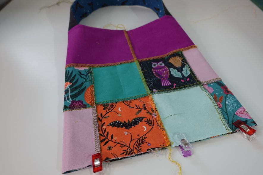 Flatlock Patchwork Trick-or-Treat Bag - secure bottom seam of flatlock patchwork bag - WeAllSew
