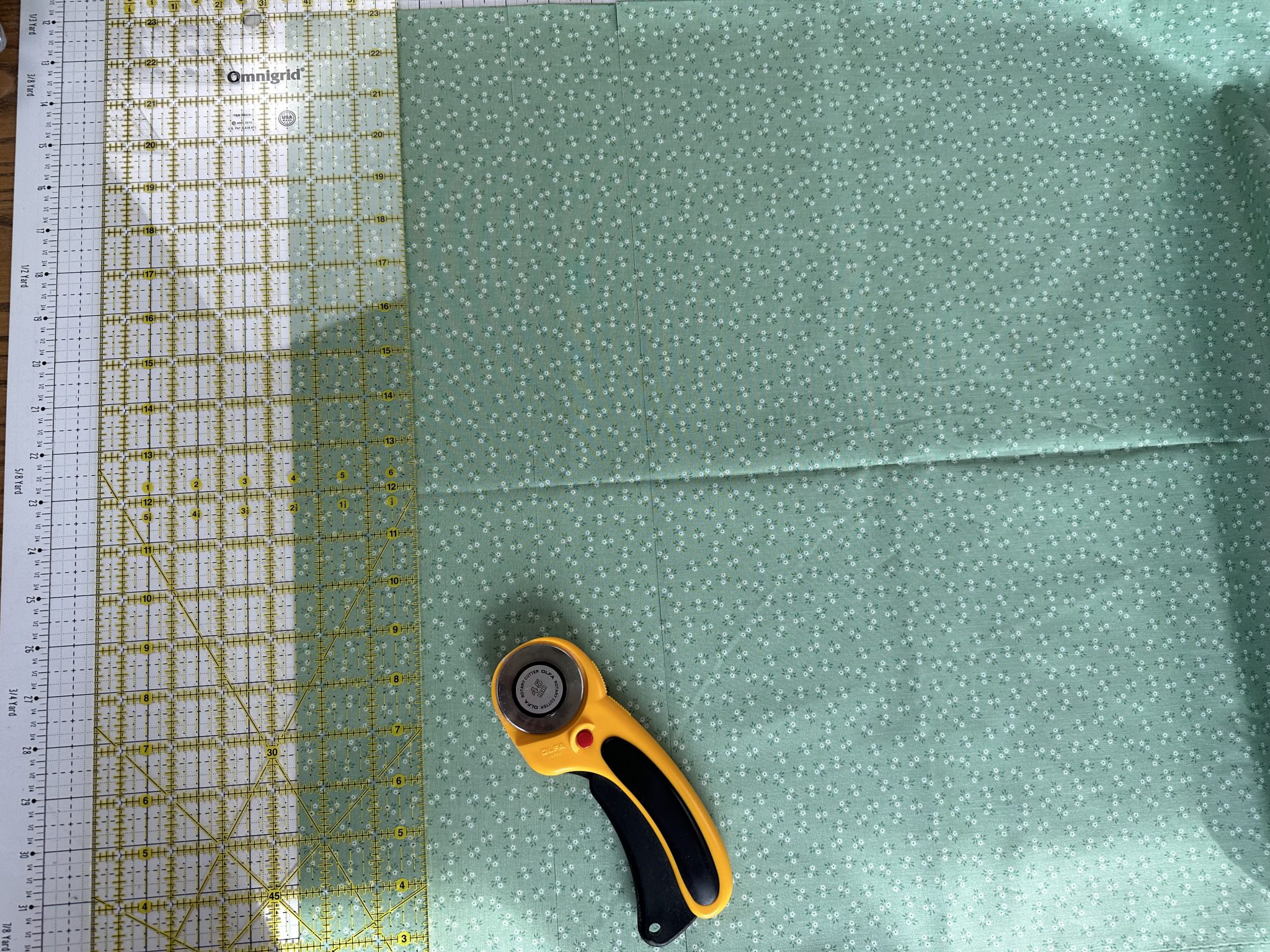 Cutting binding fabric with a ruler and rotary cutter Nona Quilt ...