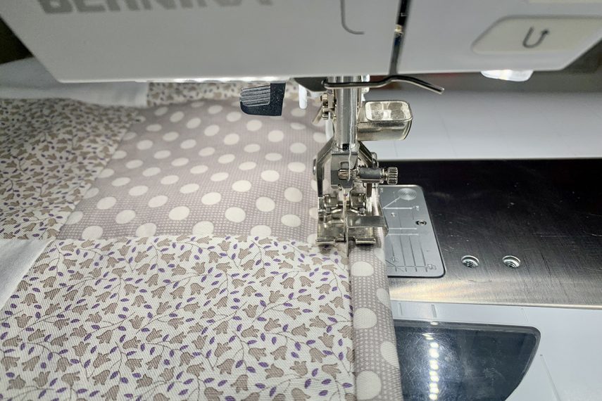 Serger_Baby_Quilt_#3_Post_30_sewing_final_stitch_on_binding_BERNINA ...