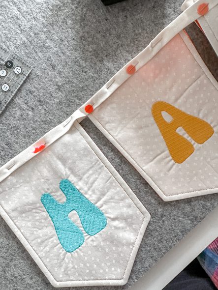 BERNINA WeAllSew Celebration Banner Tutorial Pin Binding 2 - WeAllSew