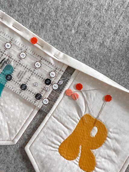 BERNINA WeAllSew Celebration Banner Tutorial Pin Binding - WeAllSew