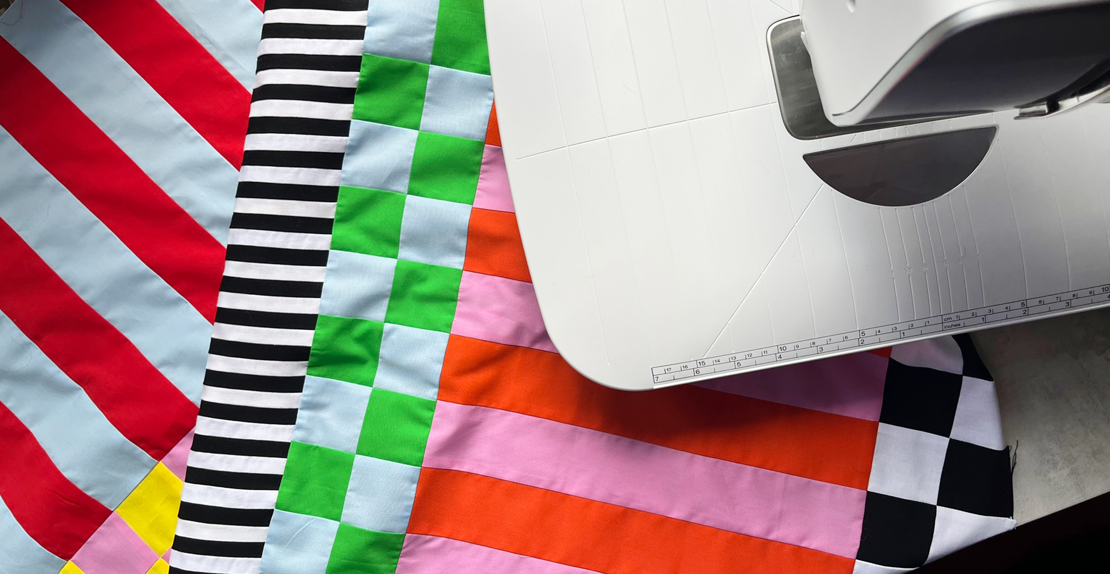 FreeQuiltPattern-ChecksMixbyJaclynSalem_2280x1180 - WeAllSew